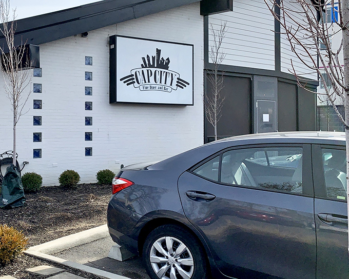 The unassuming exterior of Cap City Fine Diner belies the culinary treasures within. Like finding a Rolex in a cereal box.