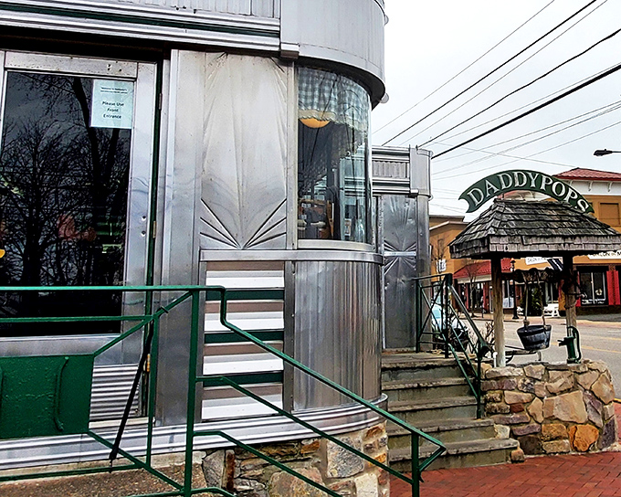 The stainless steel exterior gleams like a time machine disguised as a diner. Step inside and travel back to when breakfast was an event, not just a meal.