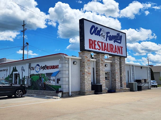 The gleaming white stone façade glows like a beacon in the night, promising weary travelers the holy trinity of road food: coffee, pie, and nostalgia.