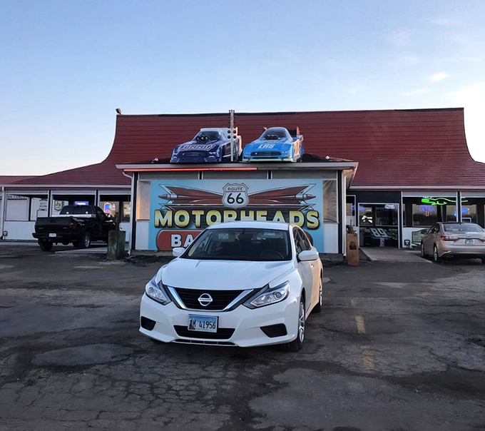 With muscle cars on the roof and classic charm inside, it&rsquo;s like a diner scene from American Graffiti.