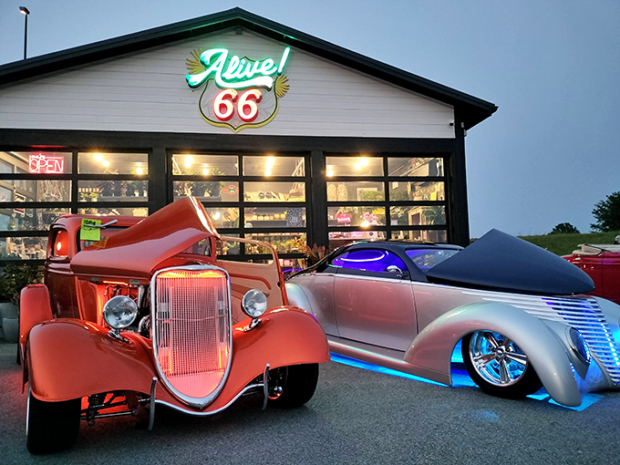 The neon "Route 66" sign beckons road warriors like a lighthouse for hungry travelers. Classic cars out front hint at the time capsule waiting inside.