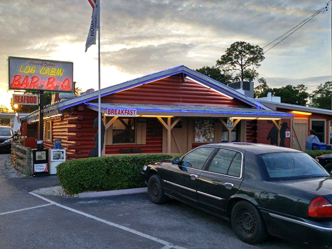 The crimson log cabin exterior isn't trying to be Instagram-worthy&mdash;it's been perfecting BBQ long before social media told us what to eat.