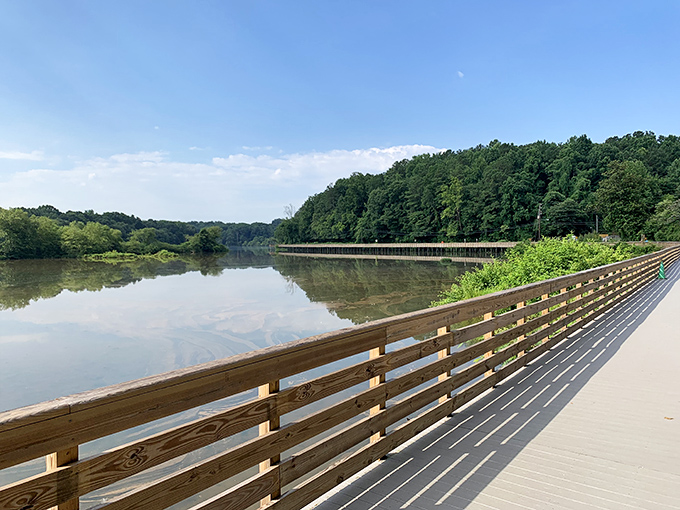 The Roswell Riverwalk stretches before you like nature's red carpet, inviting you to stroll alongside the Chattahoochee's gentle flow.