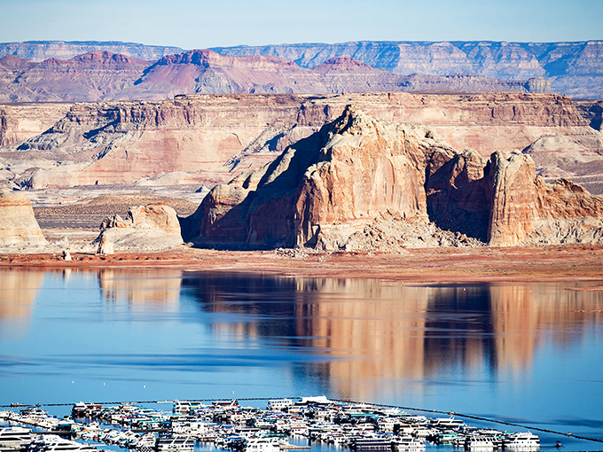 Mother Nature showing off again! The dramatic contrast between Lake Powell's azure waters and the rusty red cliffs creates a painting that no artist could fully capture.