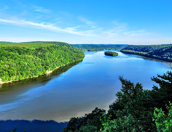 Nature's own IMAX experience! The Susquehanna River curves majestically through lush green hills, with Crow Island sitting like nature's centerpiece in this breathtaking panorama.