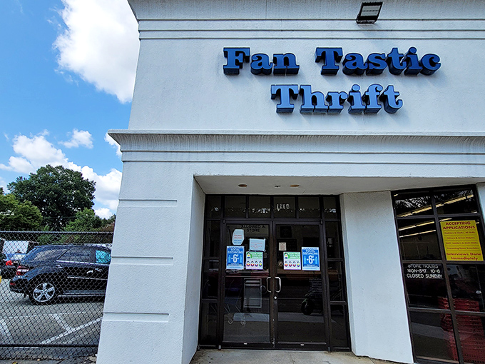 The blue sign beckons like a portal to treasure-hunting paradise. Fan Tastic Thrift's unassuming exterior hides a universe of possibilities within.