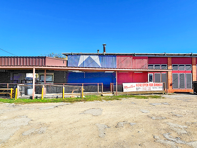 The iconic brick exterior of Louie Mueller Barbecue stands as a beacon of hope for hungry travelers. Texas barbecue pilgrims have been making this journey for generations.