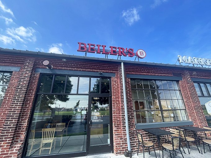The brick facade of Beiler's welcomes donut pilgrims with its iconic red sign, promising sweet salvation within these hallowed walls.