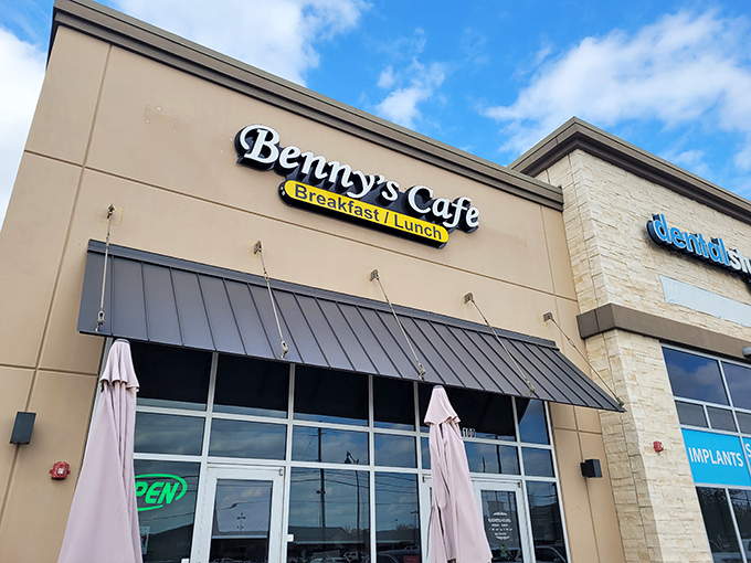 Benny's Cafe stands like a beacon of breakfast hope in a suburban strip mall, promising morning salvation under the Texas sky.