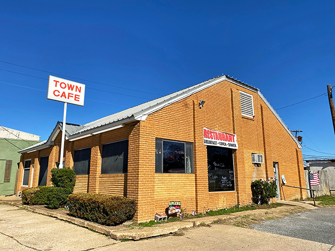 The unassuming brick exterior of Town Cafe stands like a time capsule in Centerville, promising honest food without the fanfare of big-city pretension.