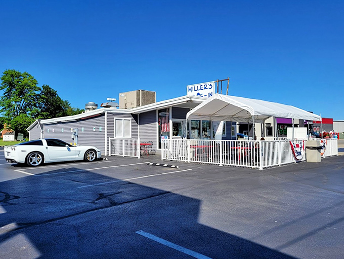 Miller's lavender-gray exterior stands like a time capsule of Americana, complete with white picket fence and the promise of frozen delights within.