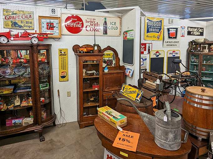 Nostalgia heaven! Vintage advertising signs from Quaker State, Coca-Cola, and Pepsi create a time-traveling wonderland that would make Don Draper weep with joy.