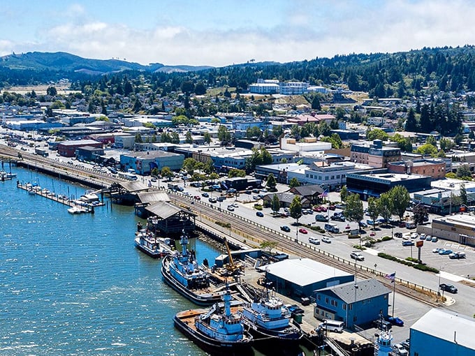 The boardwalk along Coos Bay offers that perfect blend of small-town charm and maritime bustle. Where else can you watch fishing boats while enjoying an ice cream stroll?