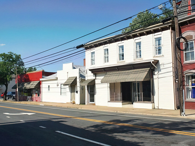 Main Street's historic buildings speak volumes about Middletown's past while housing its vibrant present. The red accents add that perfect touch of small-town charm.