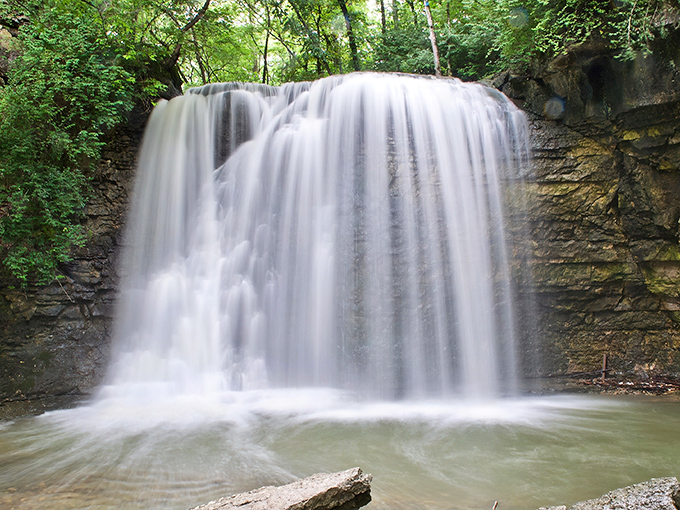 Nature's most impressive magic trick: turning ordinary limestone into a 35-foot spectacle that would make even Niagara pause for a moment of respect.