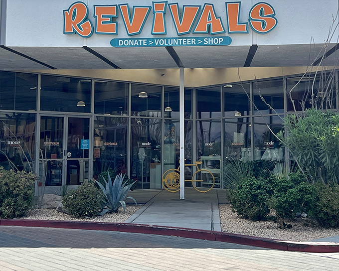 Revival's bold blue and orange signage stands out against the desert backdrop like a mid-century modern oasis promising treasure within.