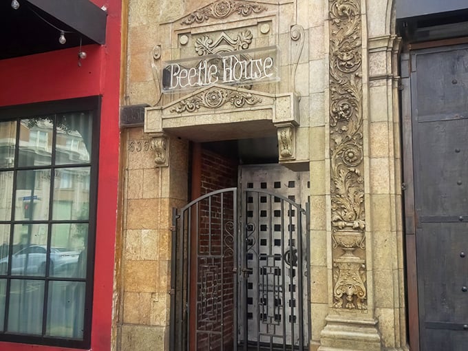 Gothic grandeur meets Hollywood glamour at this ornate entrance that promises theatrical dining adventures. 