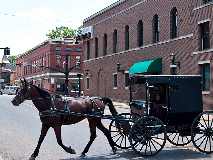 Downtown Millersburg's Victorian-era storefronts stand like colorful soldiers, guarding the town's rich history while welcoming modern visitors with open doors.