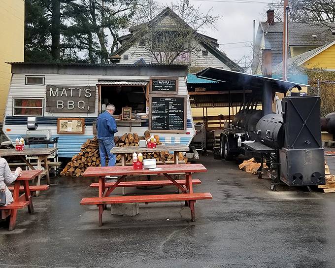 The humble blue trailer that launched a thousand BBQ pilgrimages. Matt's BBQ proves greatness doesn't require fancy digs&mdash;just wood, smoke, and patience.