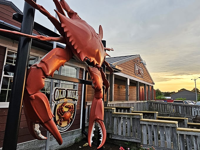The iconic red exterior with its giant crab sign is like a lighthouse for hungry seafood lovers navigating the Delmarva Peninsula.
