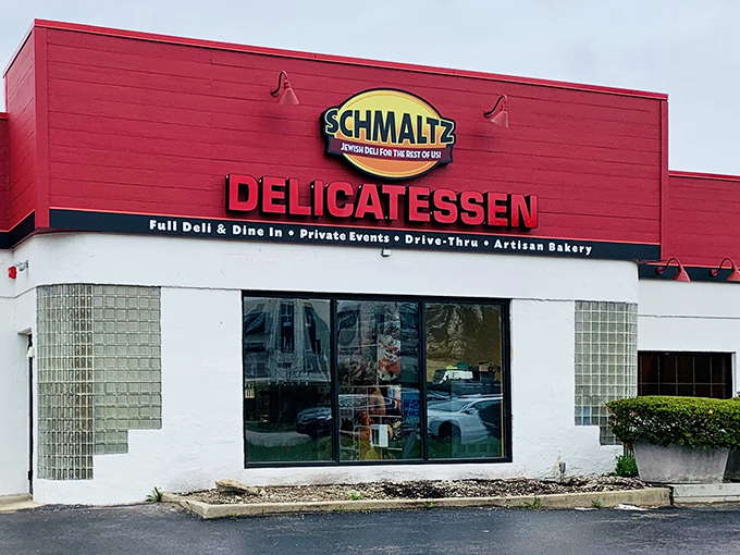 The bright red facade of Schmaltz Delicatessen stands out like a beacon of hope for bagel lovers in the suburban wilderness of Lisle.