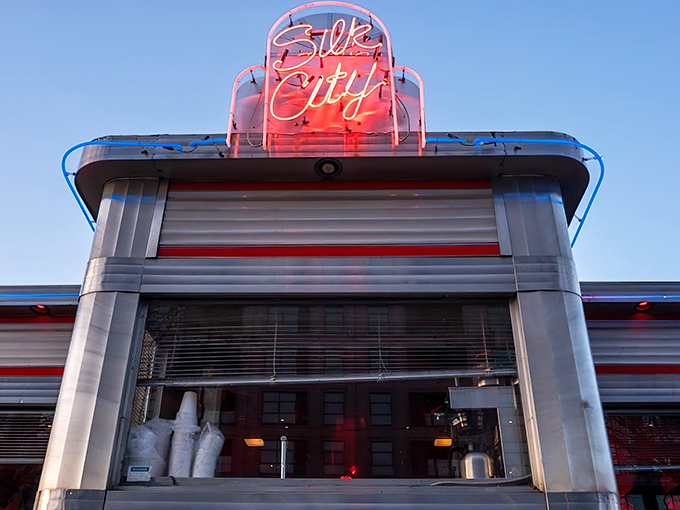 That neon glow against the twilight sky isn't just a sign&mdash;it's a beacon calling hungry souls to food nirvana.