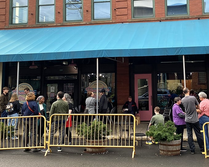 The iconic blue awning of Pamela's Diner in Pittsburgh's Strip District beckons breakfast enthusiasts like a beacon of hope for the hungry.