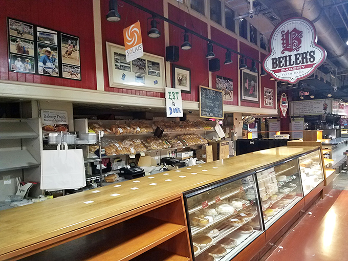 The bustling Reading Terminal Market houses Beiler's Bakery, where donut dreams come true and diet plans go to die gloriously.