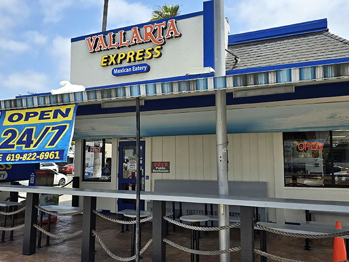 The blue and white facade of Vallarta Express stands like a 24/7 beacon for hungry souls wandering Pacific Beach. No fancy frills, just honest Mexican food waiting inside.