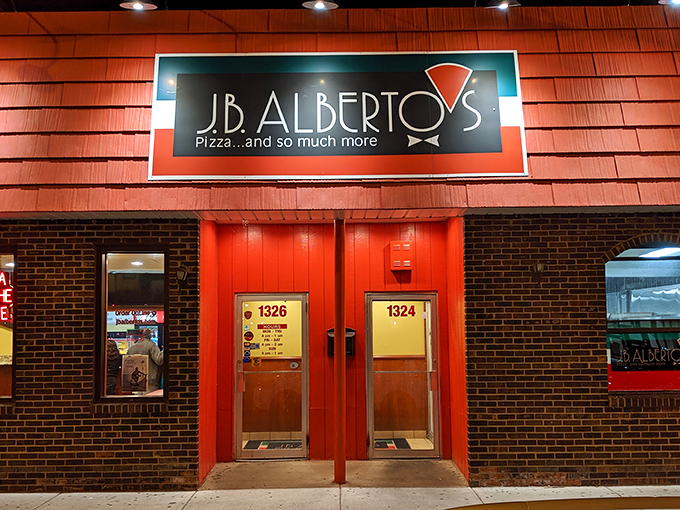The iconic red awning of J.B. Alberto's stands out on Sheridan Road like a beacon calling hungry Chicagoans home. Pizza salvation awaits inside.
