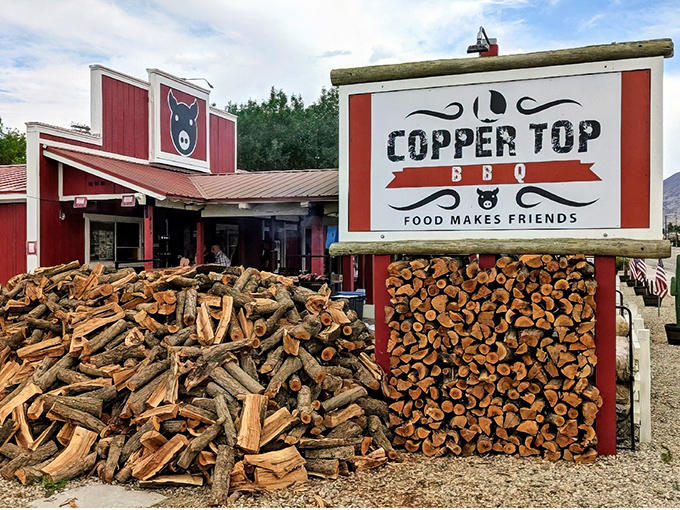 The woodpile outside Copper Top BBQ isn't just for show&mdash;it's the secret ingredient that transforms ordinary meat into smoky perfection.