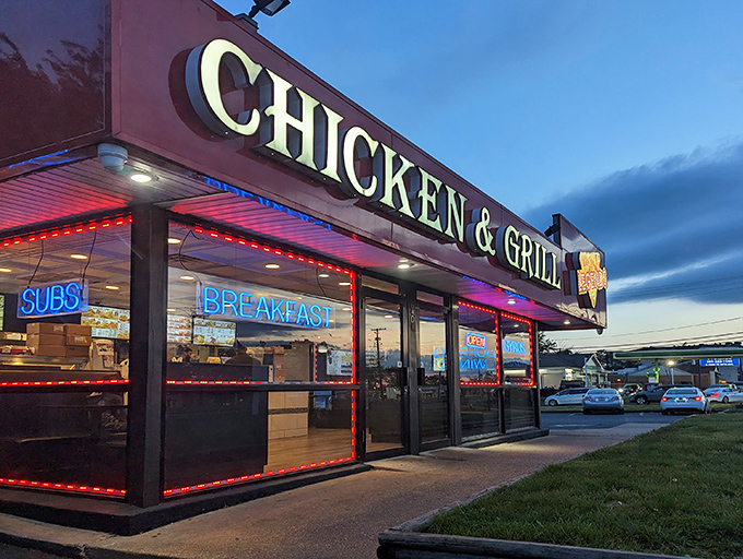 The bright red roof of Legends stands like a culinary lighthouse, beckoning hungry travelers with neon promises of chicken salvation in Hyattsville.
