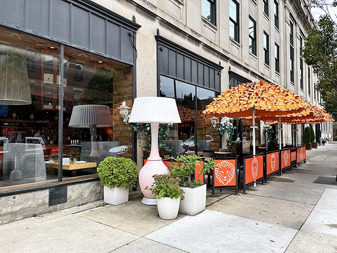 Forno's inviting exterior beckons with cheerful orange umbrellas and sleek design. The Short North hotspot practically whispers, "Come in, we've got pizza that will change your life."
