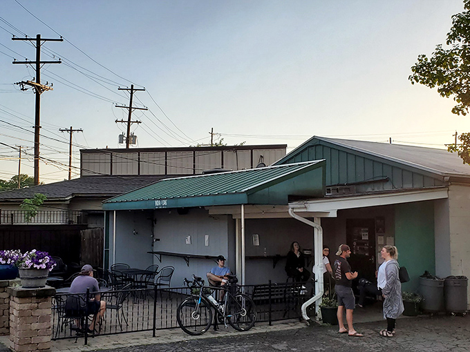 Not all treasures wear fancy packaging! India Oak's modest exterior, with its charming green-trimmed roof and flower-filled patio, is Columbus's version of a culinary speakeasy.