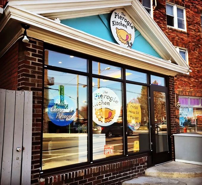 That cheerful blue storefront practically winks at you from the sidewalk, promising pierogi paradise within.