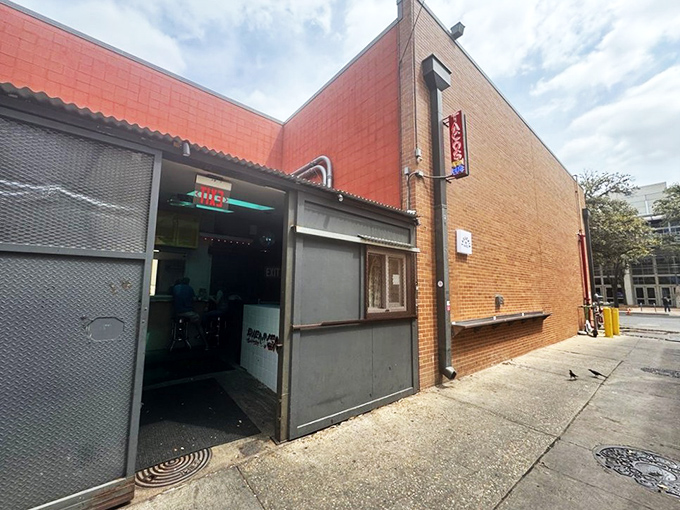 The unassuming brick exterior of Taqueria De Diez proves once again that culinary treasures often hide behind the most modest facades.