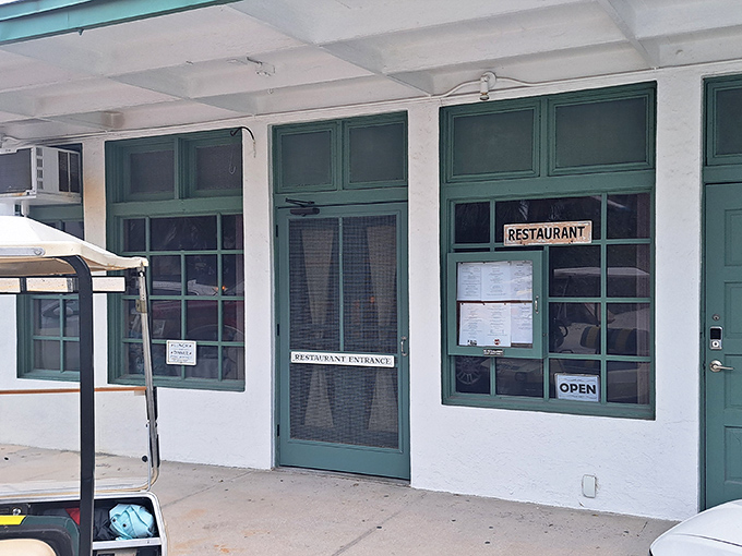 The unassuming entrance to Temptation Restaurant might fool you, but locals know this modest doorway leads to seafood paradise.