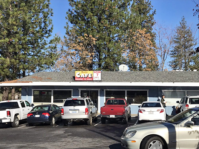 The blue exterior of Mandy's Breakfast House stands like a humble treasure chest, promising golden breakfast delights within. No fancy frills needed when the food does the talking.