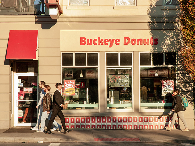 The iconic Buckeye Donuts storefront stands proudly on High Street, its vintage neon sign a beacon of hope for the hungry at any hour.