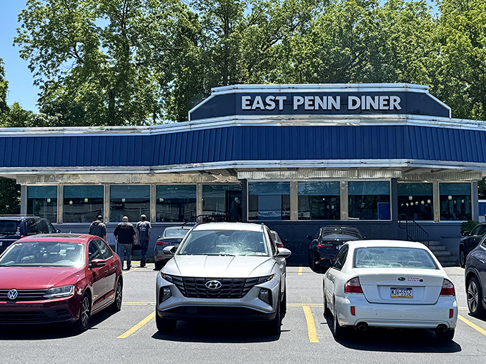 That classic blue and white diner exterior promises the kind of breakfast magic your grandmother would approve of.