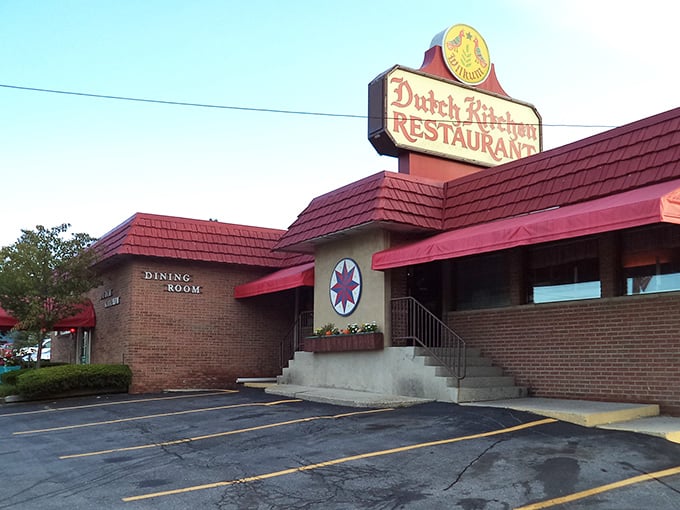 The iconic red-roofed Dutch Kitchen stands proudly along I-81, its vintage sign beckoning hungry travelers like a lighthouse for comfort food enthusiasts.