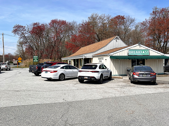 Unassuming white building with a simple "BREAKFAST" sign? That's the universal signal for "life-changing eggs ahead." Trust the packed parking lot.