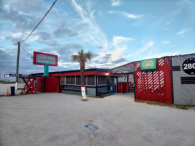This isn't just a restaurant on the beach&mdash;it's practically IN the beach. Red and teal weathered wood that's seen a thousand sunsets and keeps on smiling.