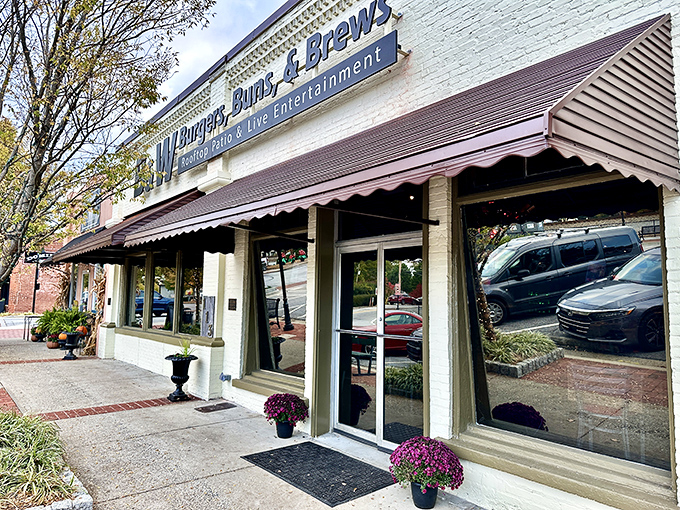 The unassuming exterior of B&W Burgers, Buns, & Brews in Norcross hides culinary treasures that would make any food detective proud.