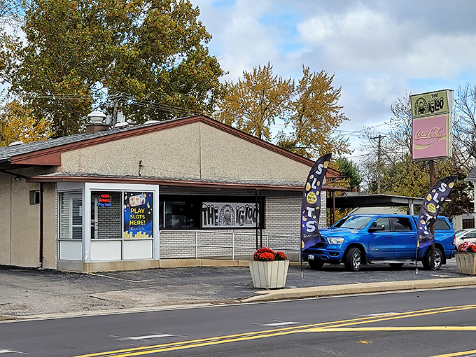 The unassuming exterior of Igloo Diner in Peru, Illinois &ndash; proof that culinary treasures often hide behind the most modest facades.