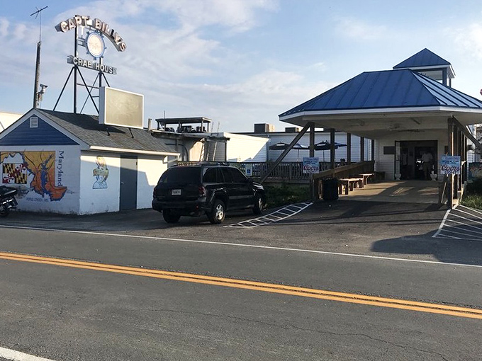 The iconic roadside sign beckons like a siren call to seafood lovers &ndash; Captain Billy's stands ready to welcome hungry travelers to crab paradise.