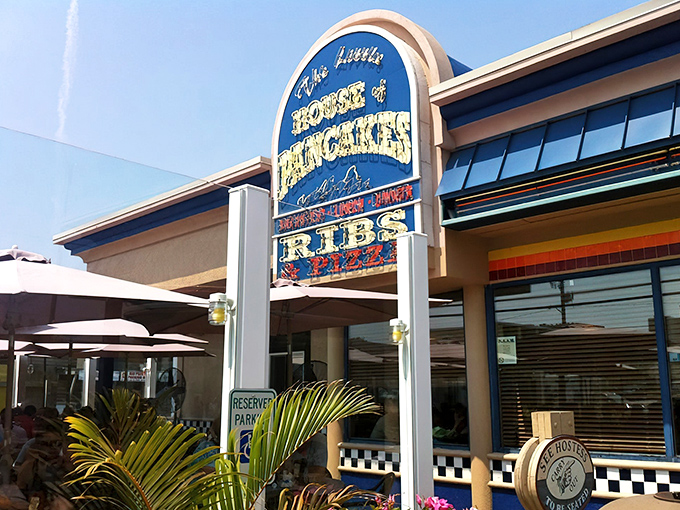The iconic blue sign beckons hungry beach-goers like a breakfast lighthouse guiding ships to pancake harbor.