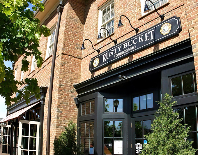 The brick fa&ccedil;ade and black trim of Rusty Bucket's New Albany location feels like that perfect neighborhood spot you'd hate to share but can't help bragging about.
