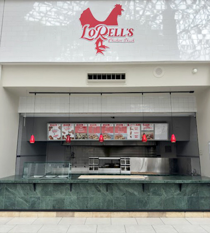 The iconic red chicken logo of LoRell's beckons from its clean, minimalist storefront&mdash;proof that greatness doesn't need flashy advertising.