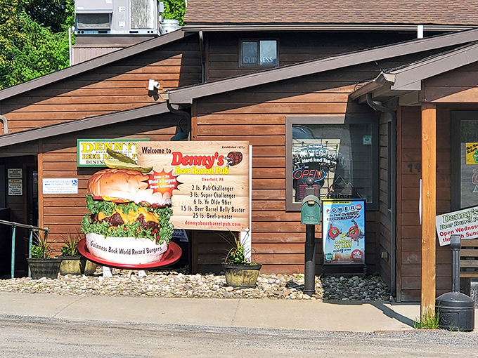 The rustic wooden exterior of Denny's Beer Barrel Pub promises burger adventures that would make Paul Bunyan himself do a double-take.